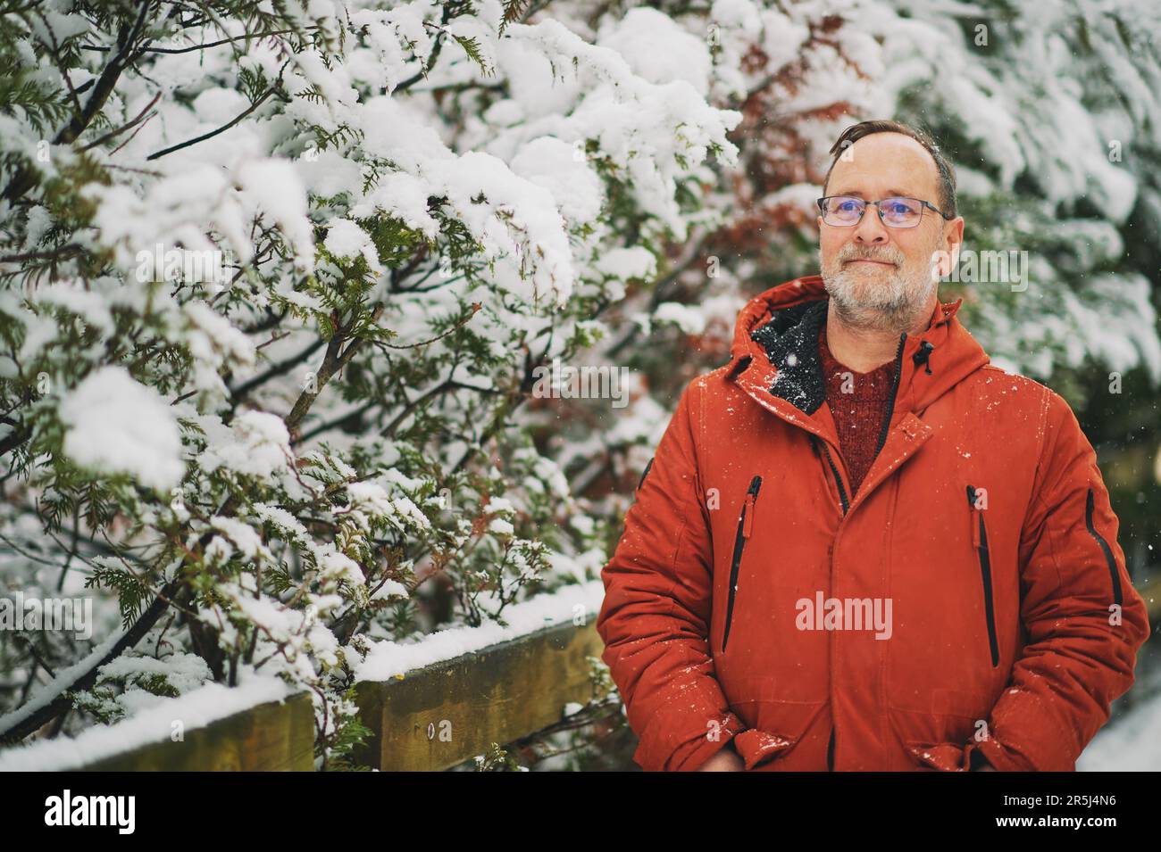 Outdoor portrait of middle age man, 55 - 60 years old, enjoying nice ...