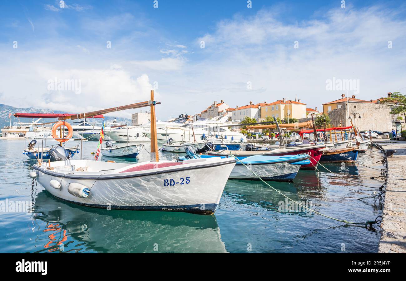 Boats bobbing up and down on the water at Budva harbour in Montenegro ...