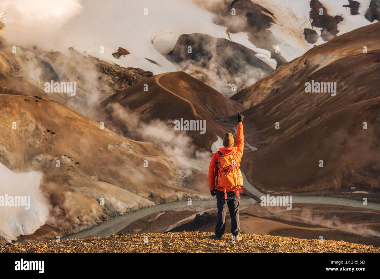 Successful hiker man standing at Kerlingarfjoll on geothermal area and ...