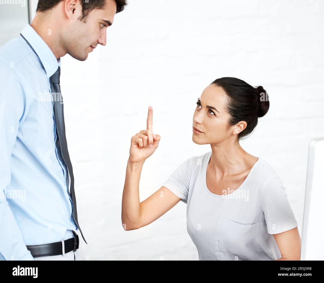 Dont push my boundaries. Two young business colleagues having a ...