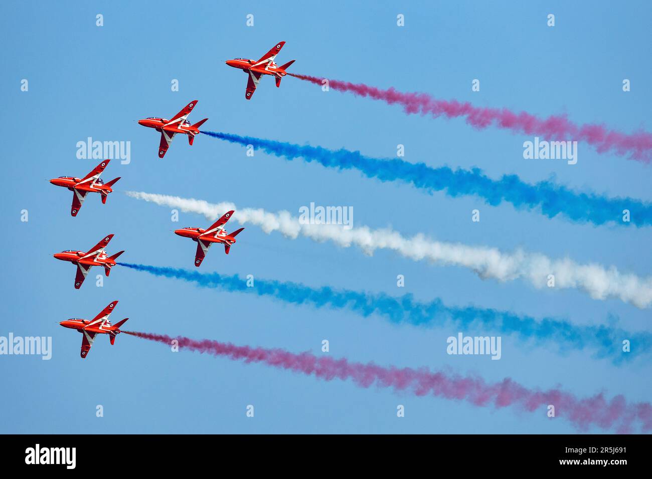 The iconic Red Arrows take to the sky above Paignton at the English Riviera 2023 Airshow Stock ...