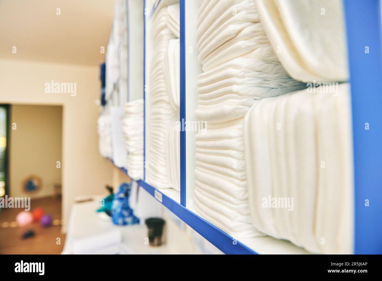 Shelf with many diapers in day care or kindergarten Stock Photo - Alamy