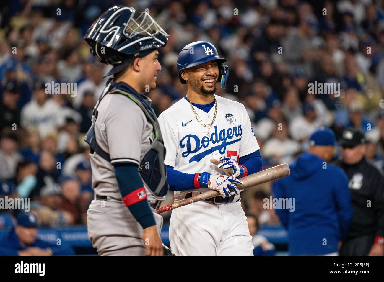 Los Angeles Dodgers right fielder Mookie Betts (50) shares a moment ...