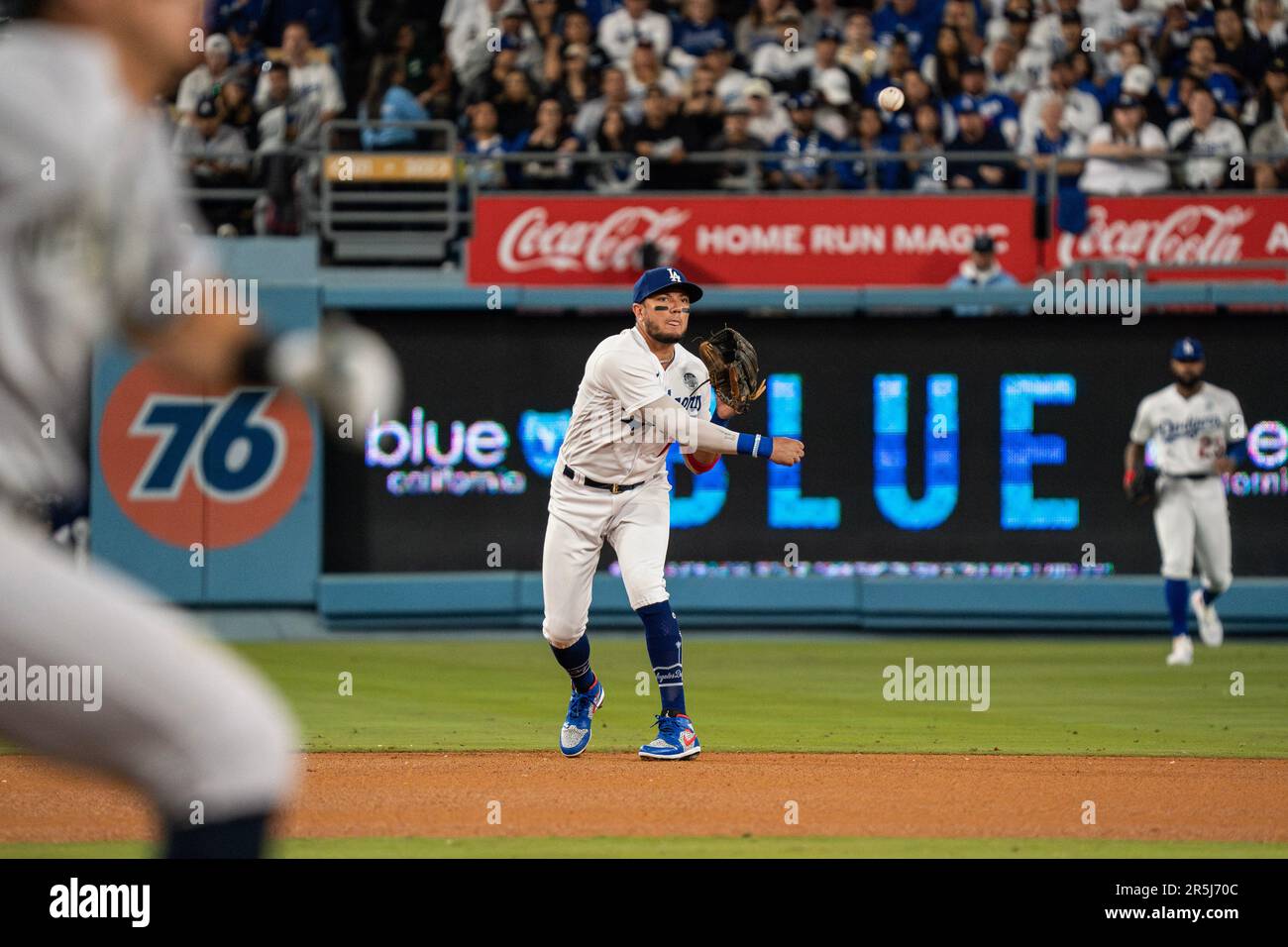Los Angeles Dodgers shortstop Miguel Rojas (11) throws to first for an ...