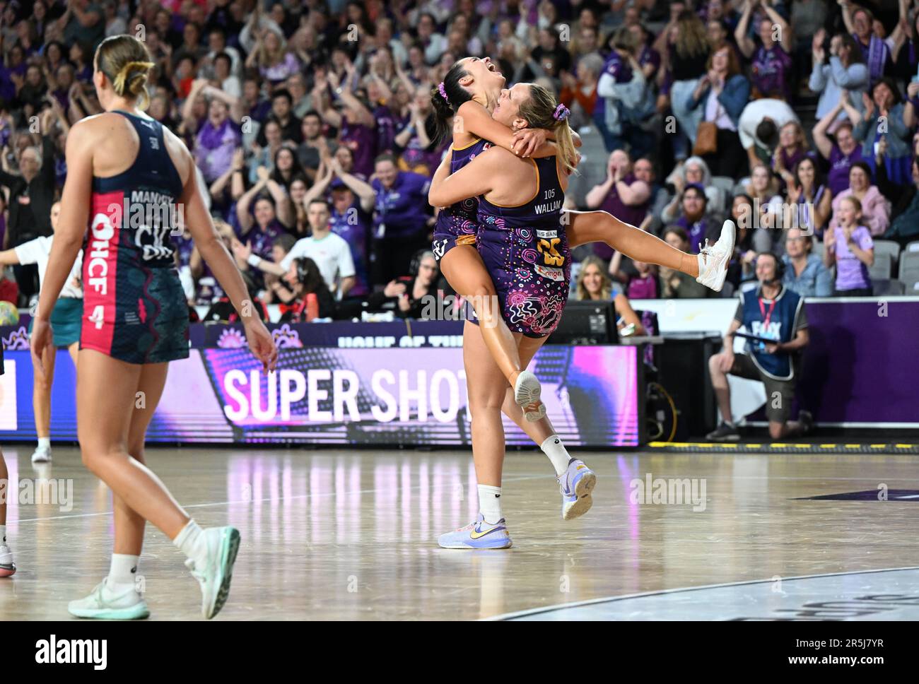 Emily Moore (left) and Donnell Wallam (right) of the Firebirds ...