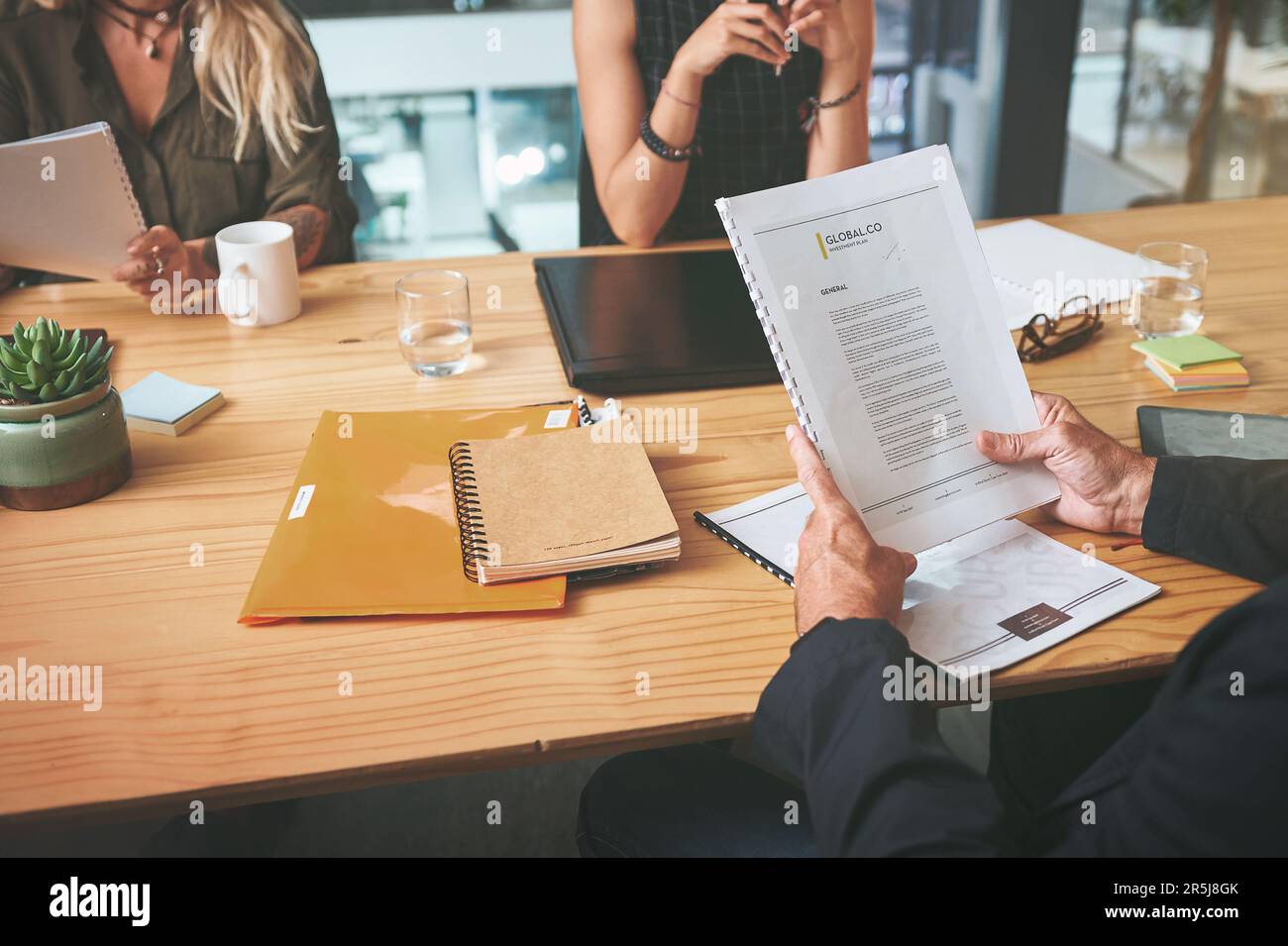 The paperwork never ends. an unrecognizable group of businesspeople ...