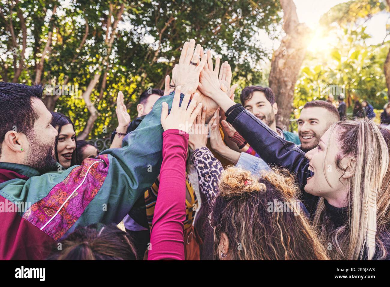 A group of friends enjoying an outdoor outing, laughing and joking ...