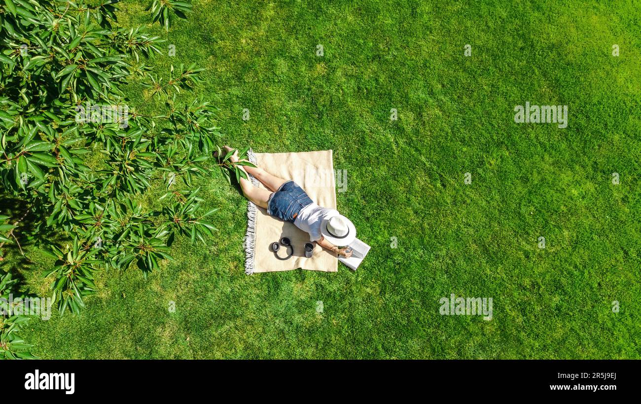 Aerial view of person sitting hi-res stock photography and images - Alamy