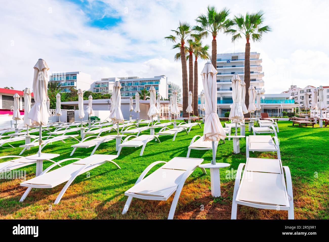Tourist resort chaise lounges . Perfect tropical vacation Stock Photo ...