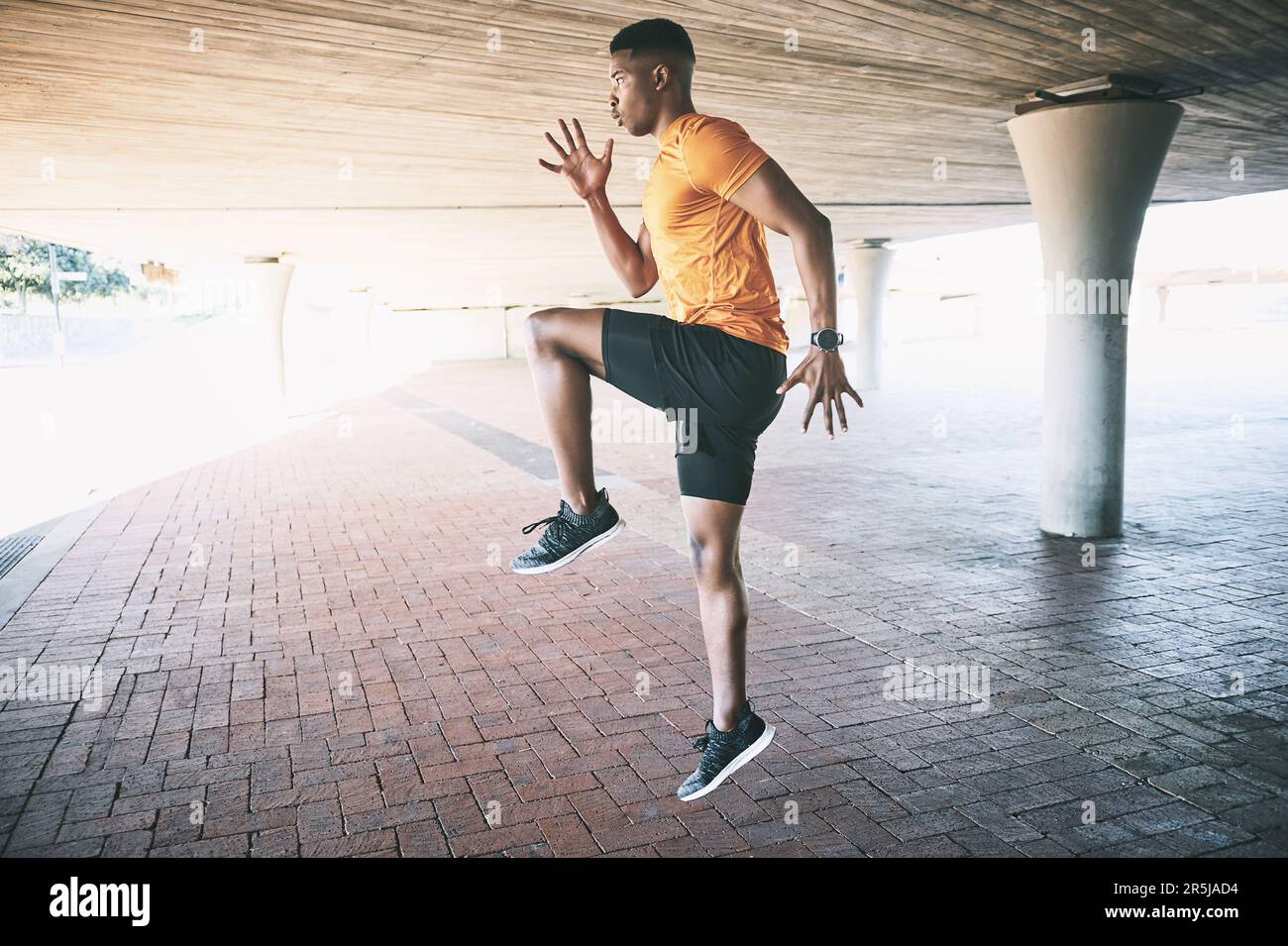 Sustainable health starts with consistency. a young man jumping during ...
