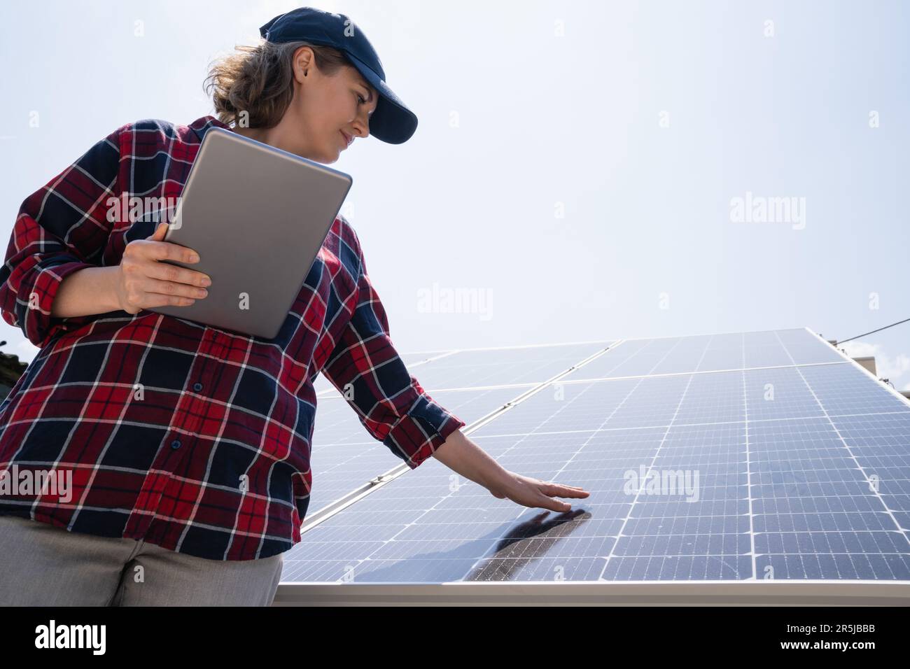 Installing solar panel hi-res stock photography and images - Alamy