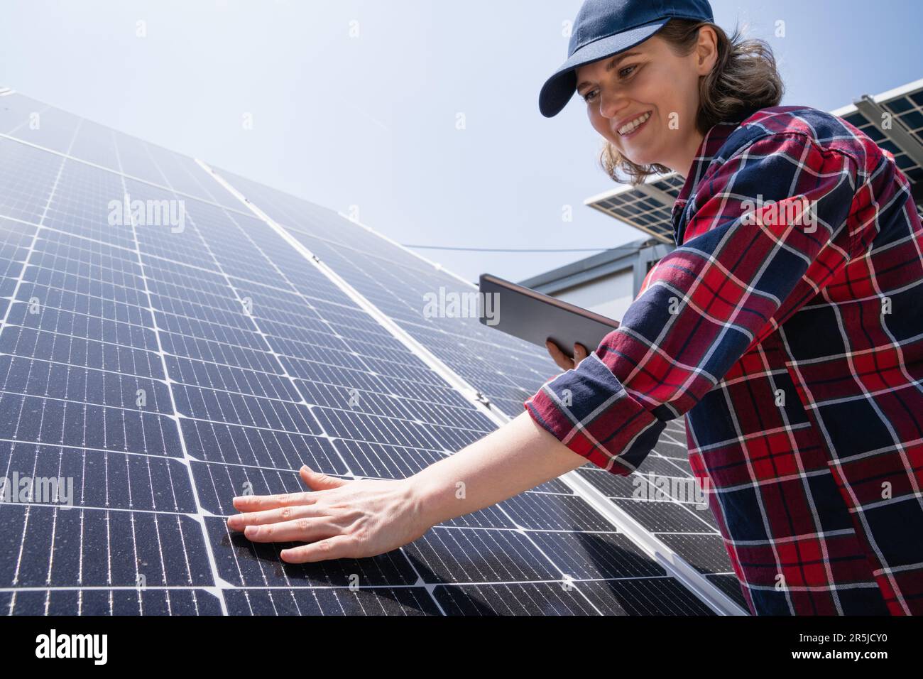 Installing solar panel hi-res stock photography and images - Alamy