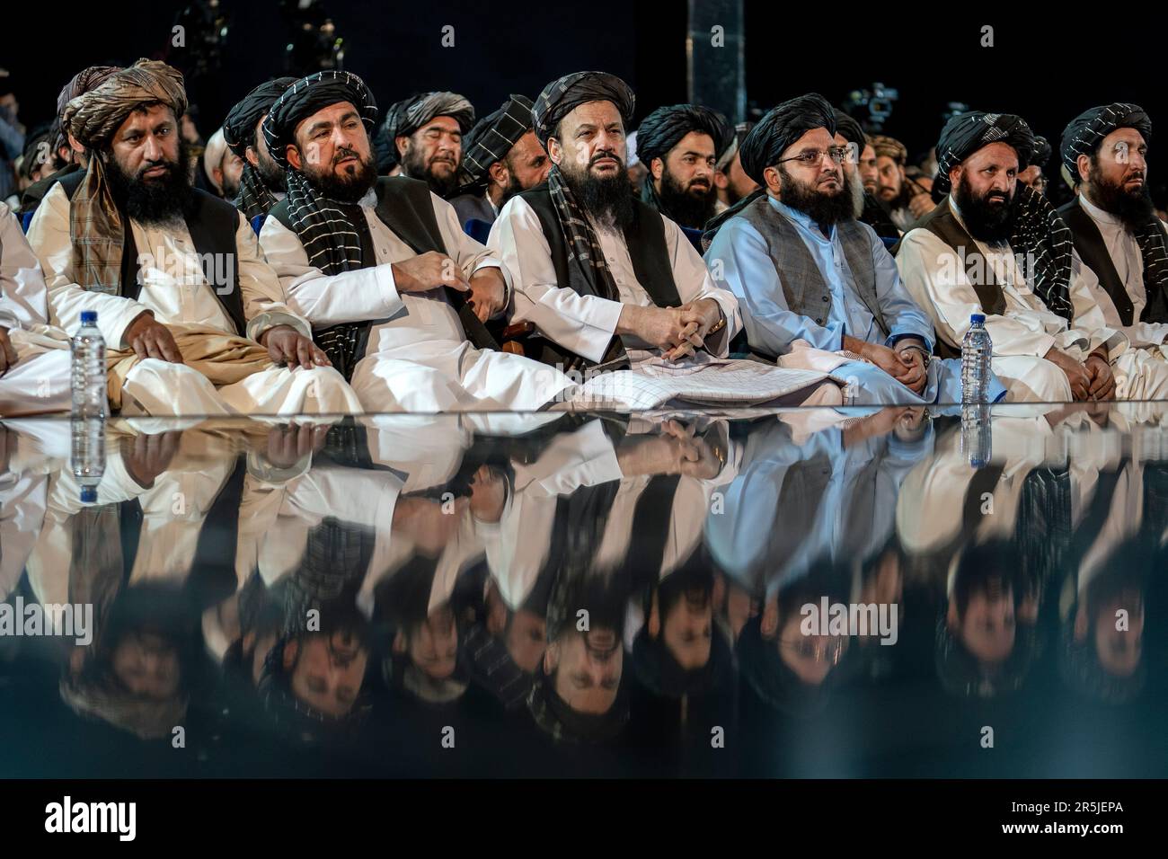 Taliban leaders attend a ceremony marking the 10th anniversary of the ...