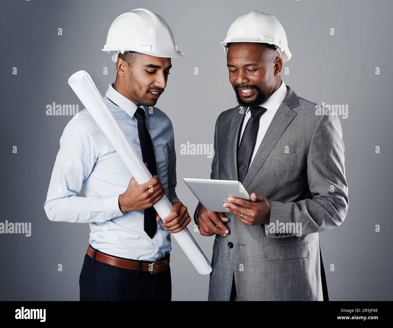 Building the cities of the future. two civil engineers discussing ...