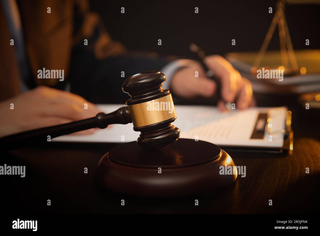 Attorney working at the office, notary public signing document Stock ...