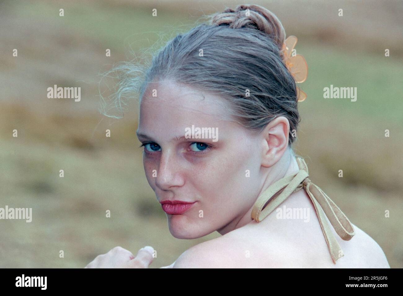 young slim pretty blonde haired woman in her early 20s posing for ...