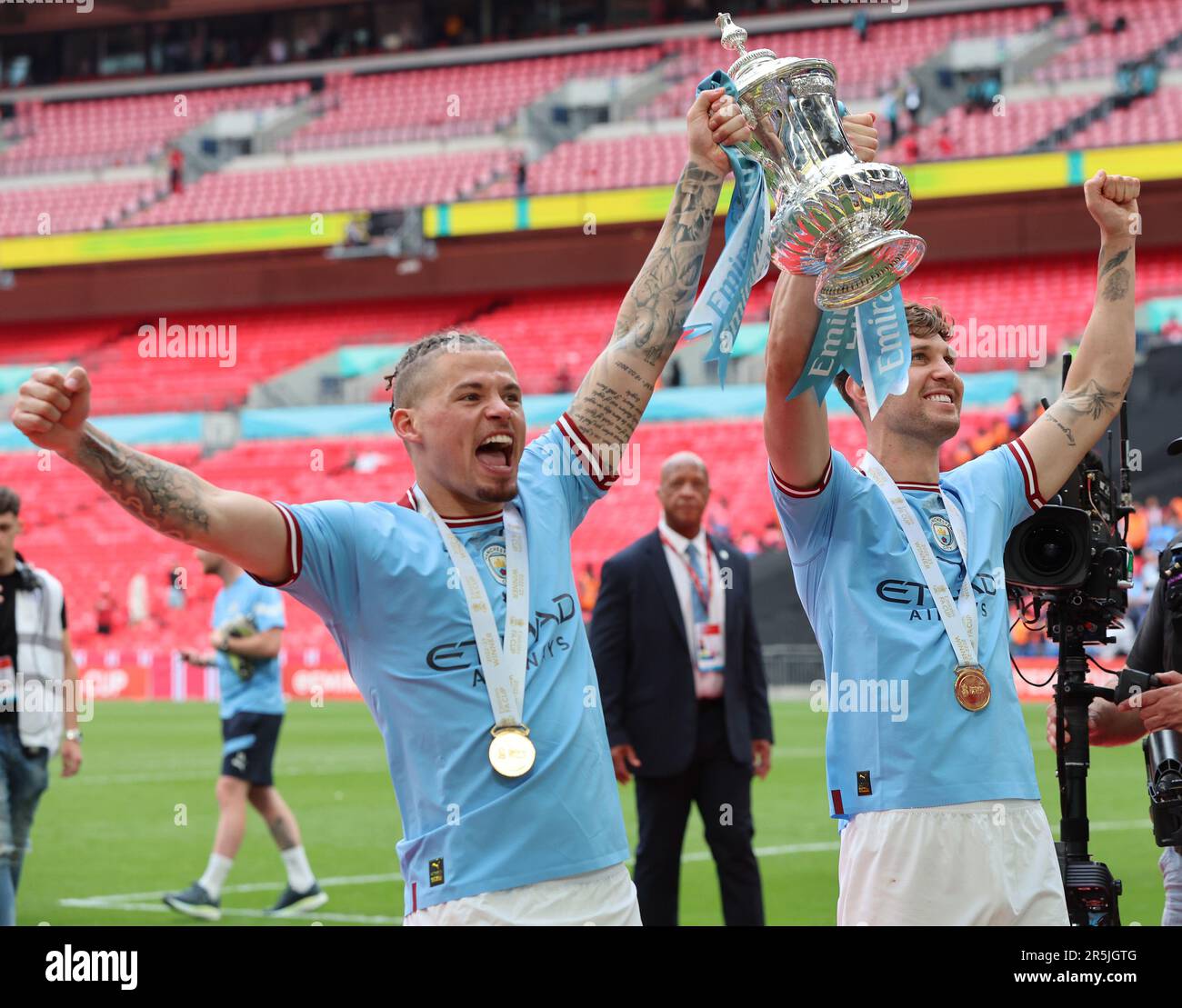 L-R Manchester City's Kalvin Phillips and Manchester City's John Stones ...