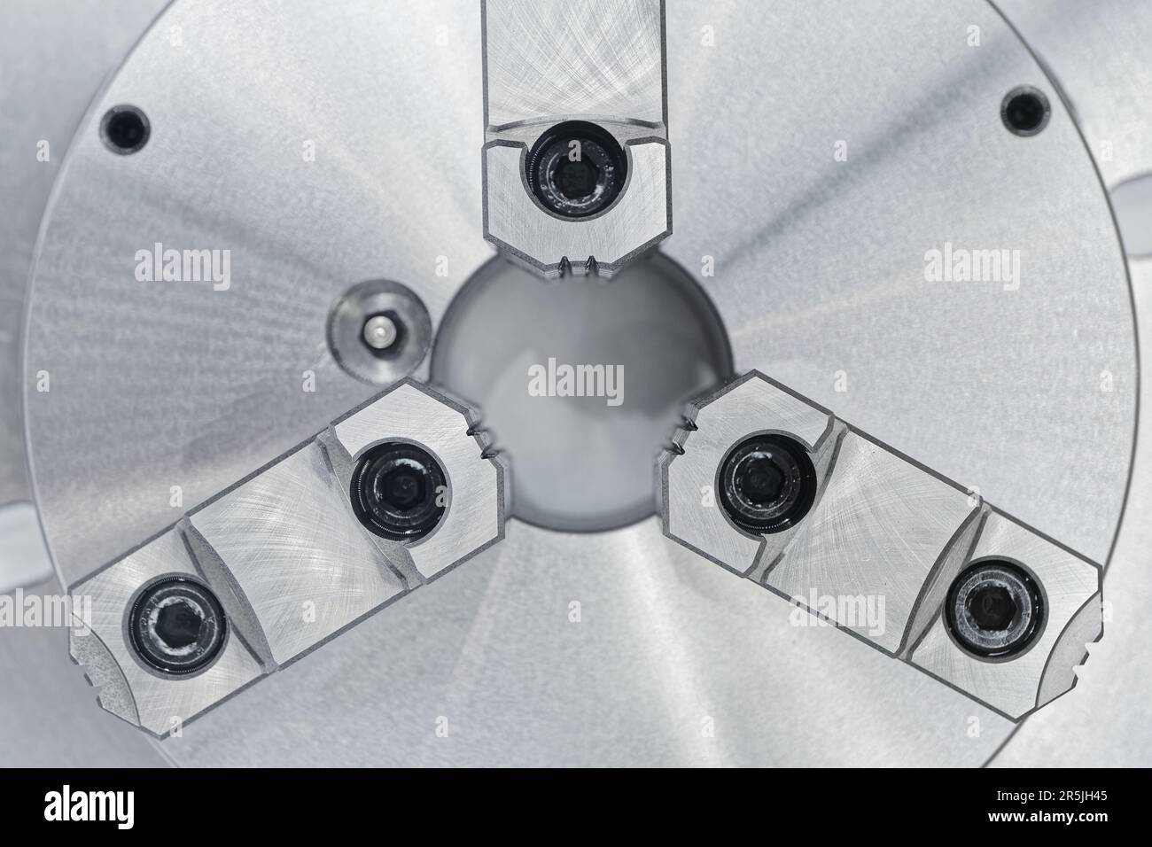 Opened lathe chuck, front view close-up shot, shallow depth of field ...