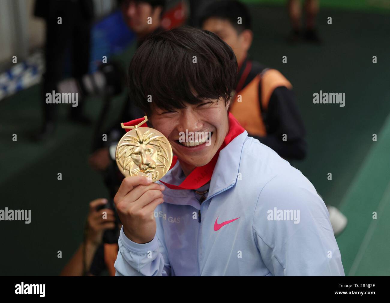 Ryuichiro Sakai of Japan celebrates after an award ceremony of men's ...