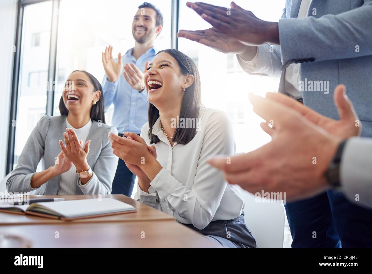 Motivation, audience with an applause and in a business meeting at work ...