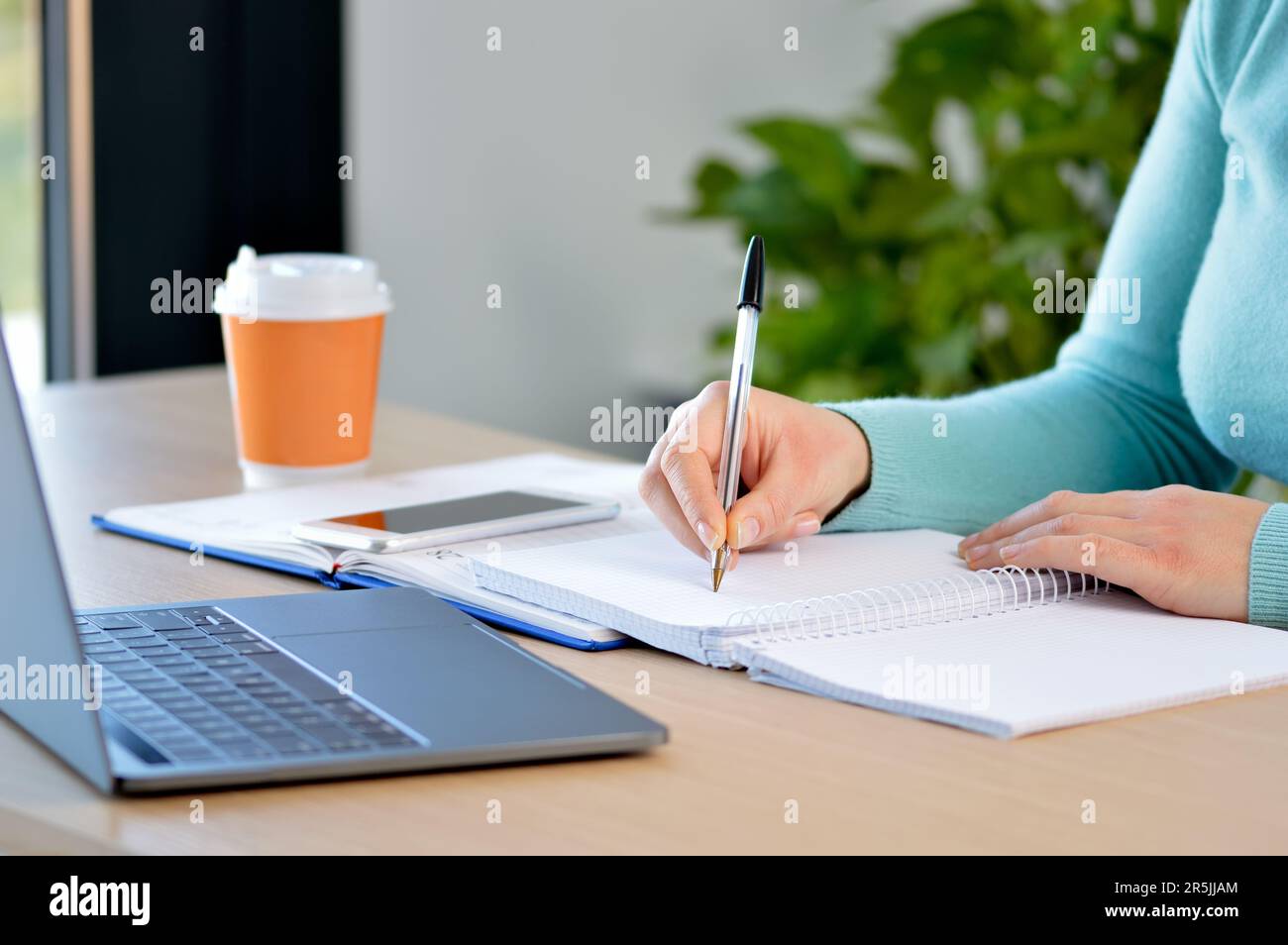 Cropped shot female hand writing hi-res stock photography and images ...