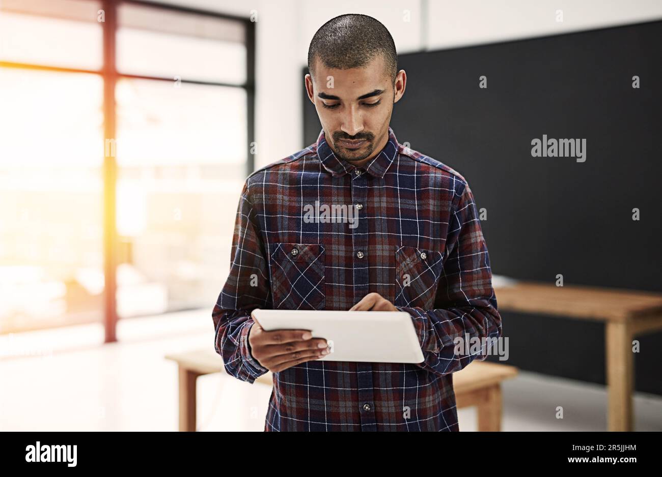 Using technology to catapult his business to success. a young ...