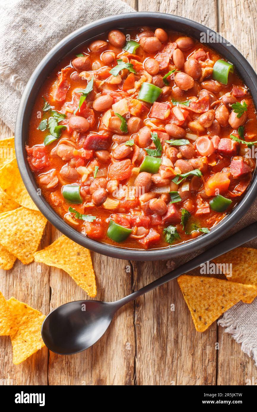 Mexican Charro Beans or Frijoles Charros with bacon, tomato, onions ...