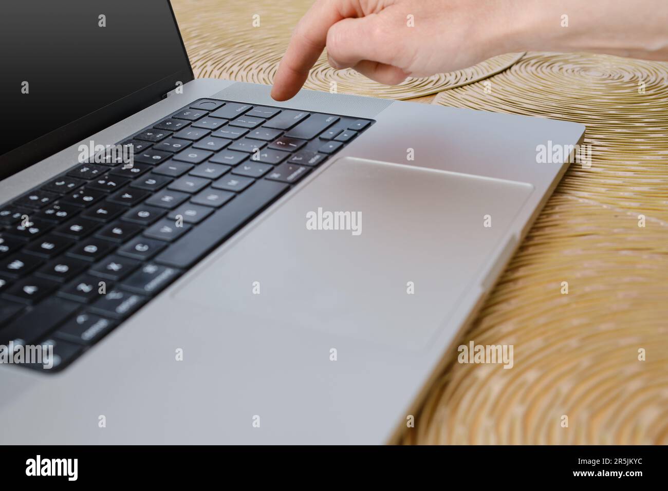 Closeup view of finger ready to press enter key on laptop Stock Photo ...
