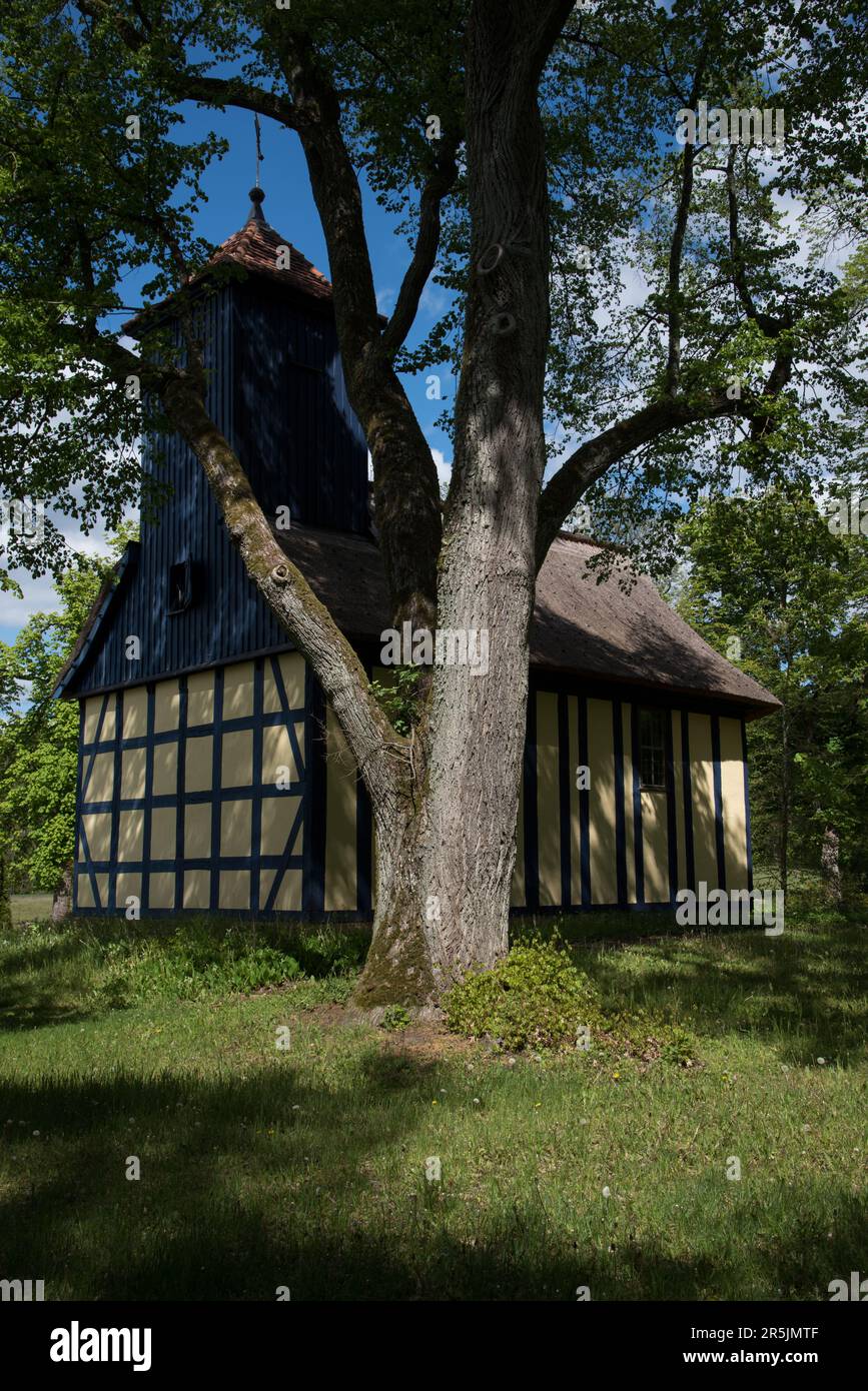 small church in the green is a tiny timber framed and restored church ...