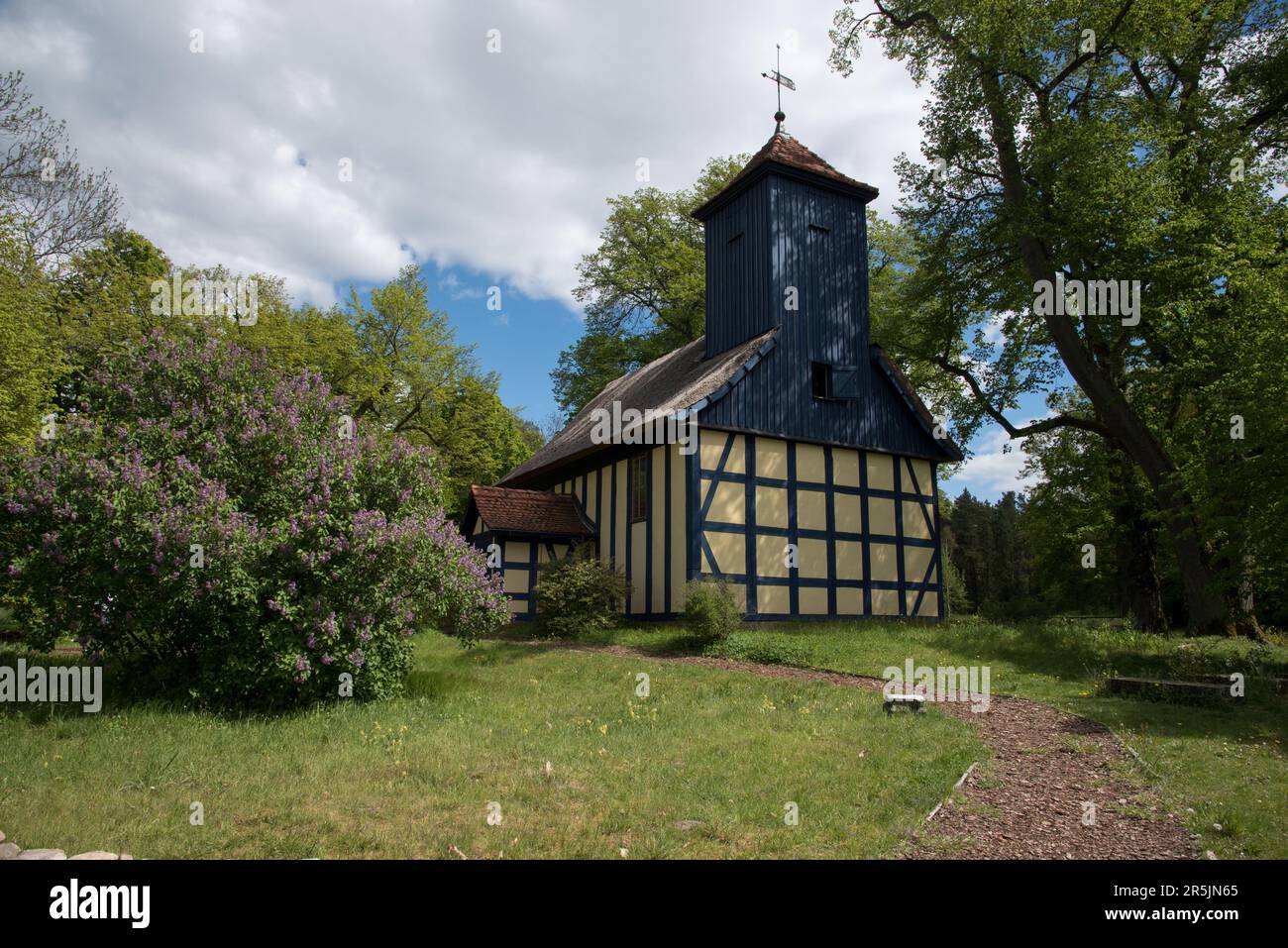 small church in the green is a tiny timber framed and restored church ...