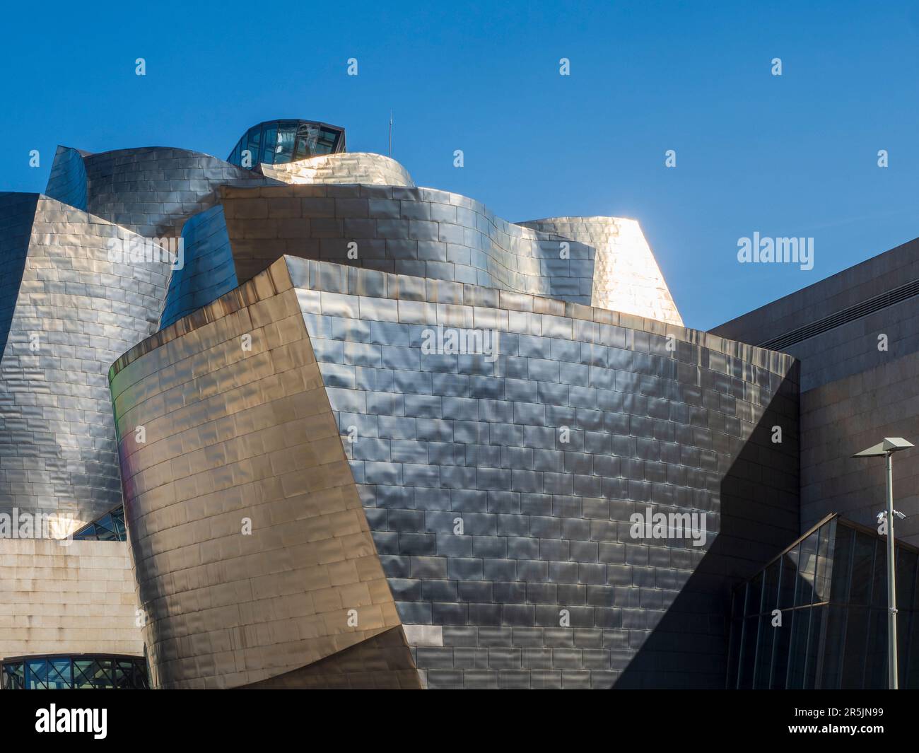 Façade of the Guggenheim Museum in Bilbao, designed by architect Frank ...