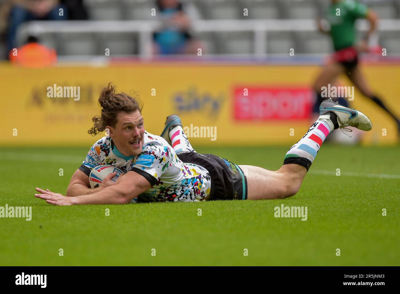 Rob Mulhern #10 of Leigh Leopards goes over for a try during the Magic ...