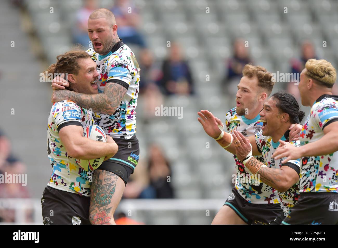 Rob Mulhern #10 of Leigh Leopards celebrates his try during the Magic ...