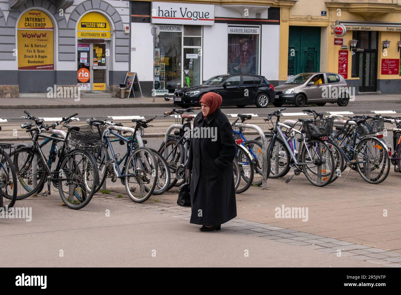 vienna, austria. 5 April 2023 afternoon wander an old woman gracefully ...