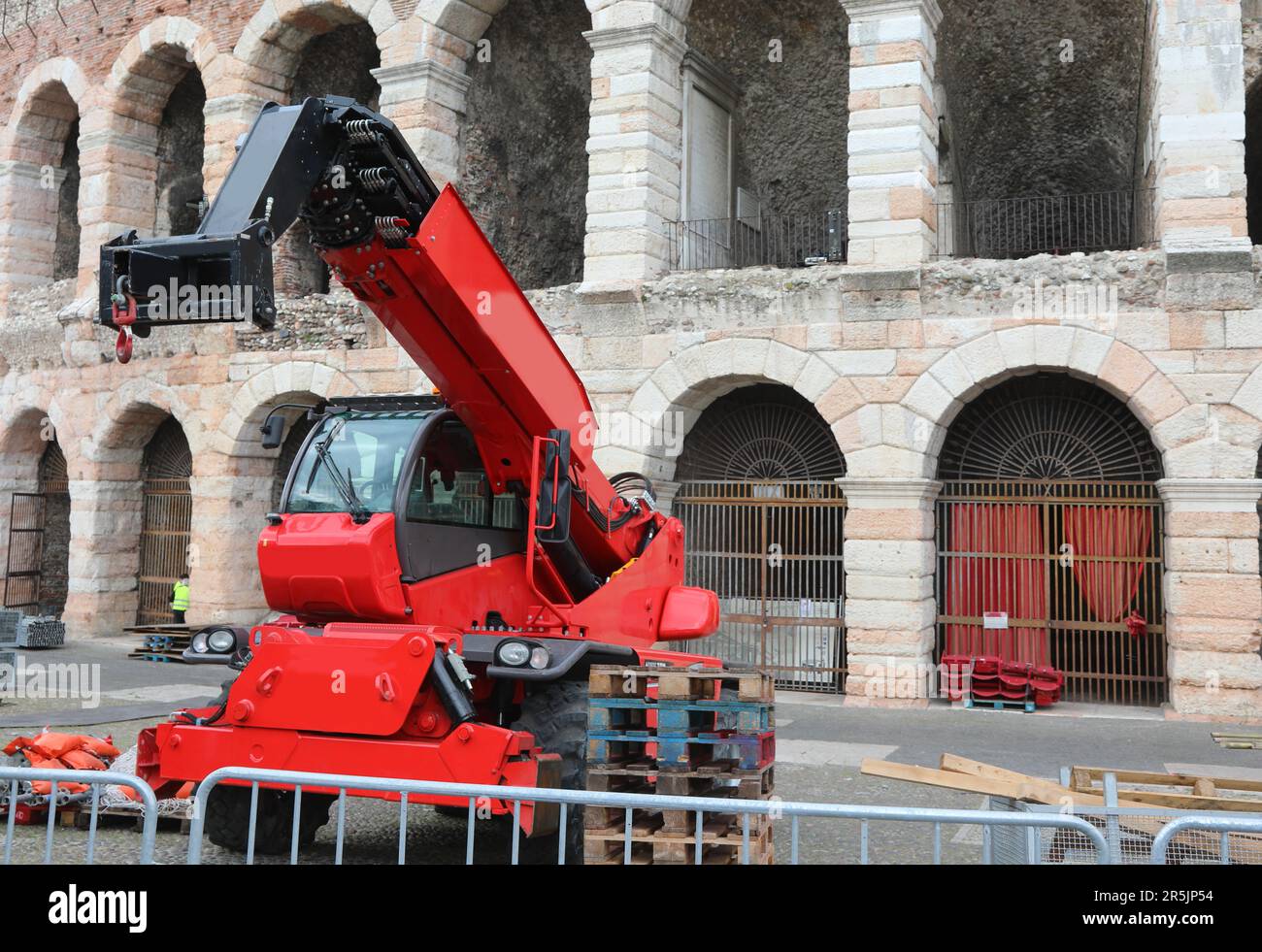 Crane machinery for assembling opera scenes outside the Roman ...
