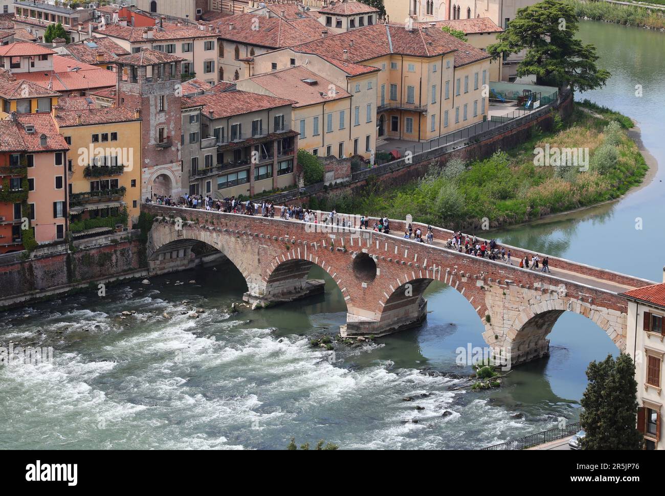 Verona City in Italy and old Stone Bridge called PONTE PIETRA over ...