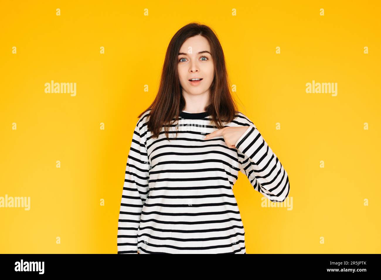 Delighted Woman Pointing at Herself in Amazement - Humorous Reaction ...