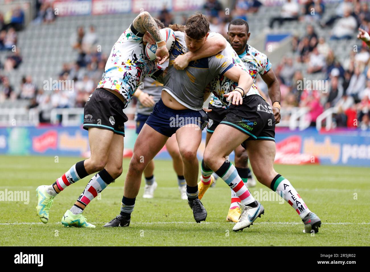 Wakefield Trinity’s Jordan Crowther (centre) is tackled during the ...