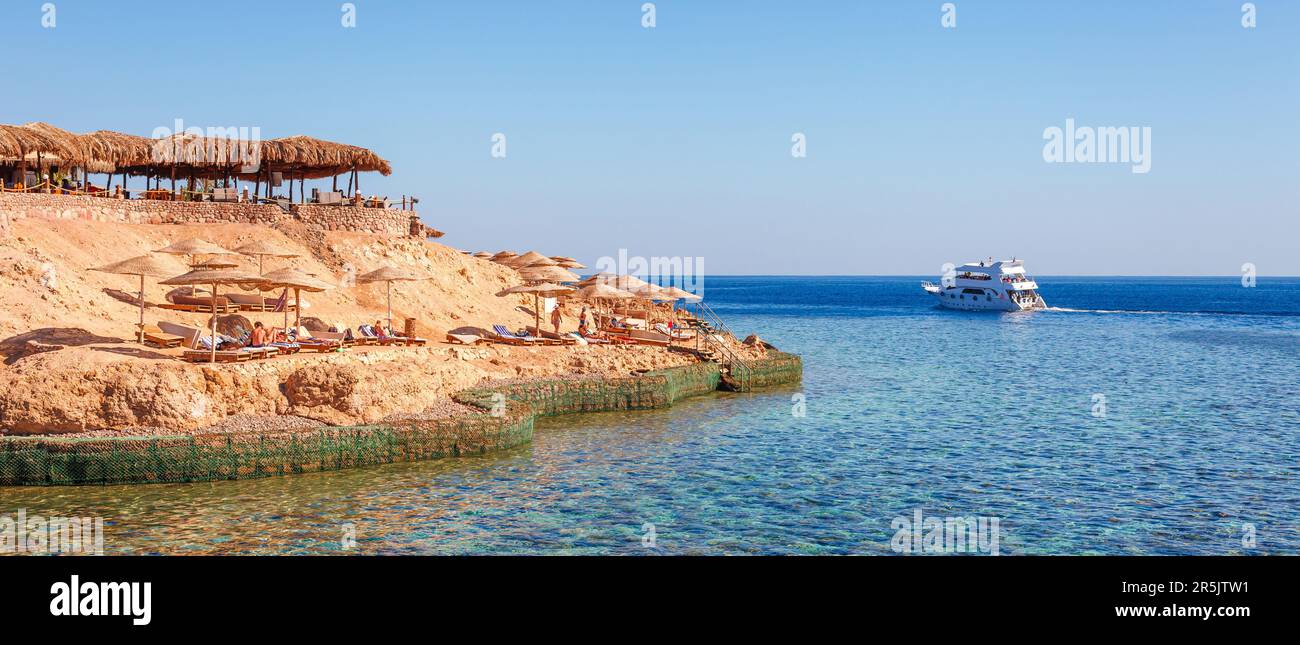 Sunny resort beach on the Red Sea in Sharm el Sheikh, Sinai, Egypt ...