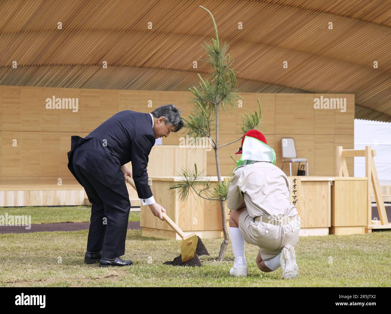 Japanese Emperor Naruhito (L) attends a national tree-planting ceremony ...