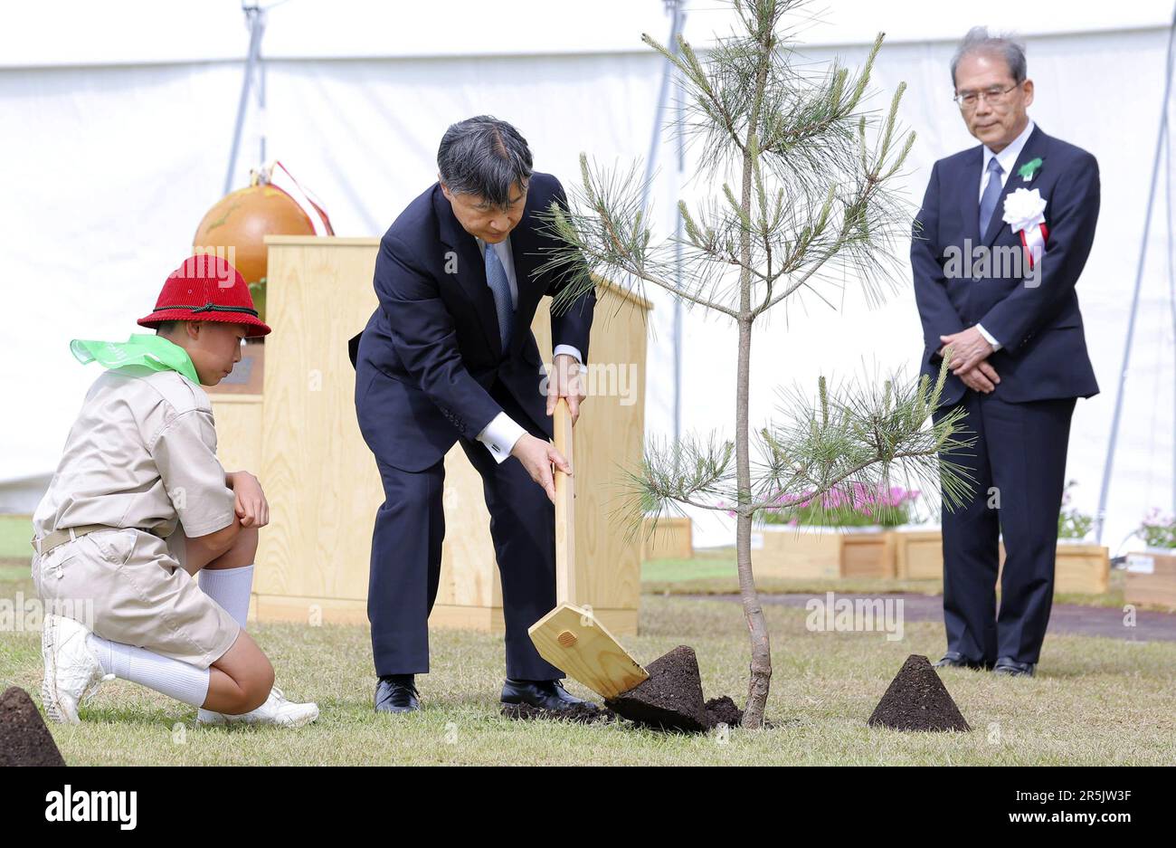 Japanese Emperor Naruhito (C) attends a national tree-planting ceremony ...