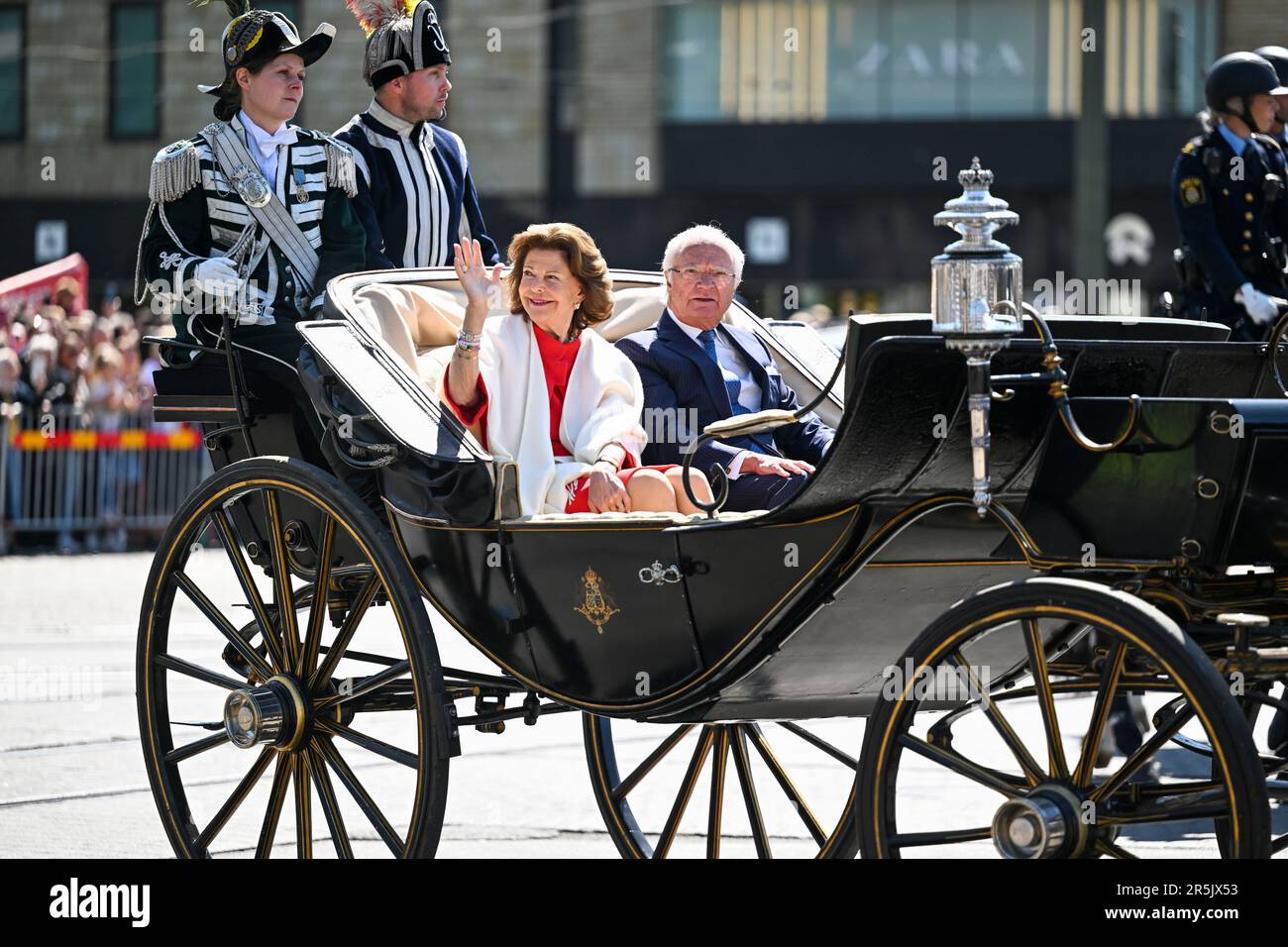 King Carl Gustaf and Queen Silvia arrive at Gustaf Adolfs Torg during ...