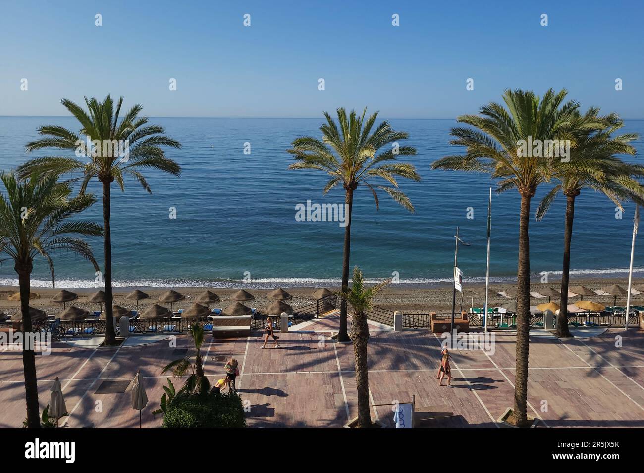 Promenade in Marbella, Spain Stock Photo - Alamy