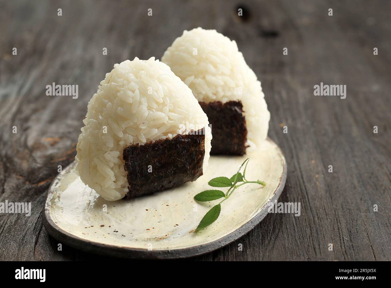 Triangle Onigiri, Japanese Rice Packed Ball with Nori Seaweed Stock ...