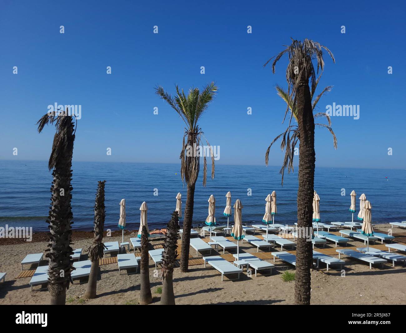 Empty beach marbella hi-res stock photography and images - Alamy