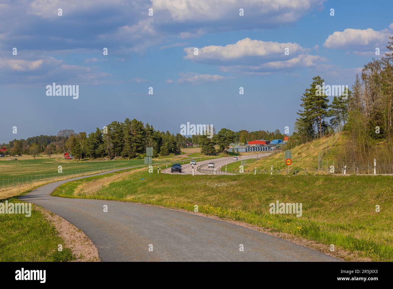 Beautiful view of highway with cars and asphalt road for pedestrians ...