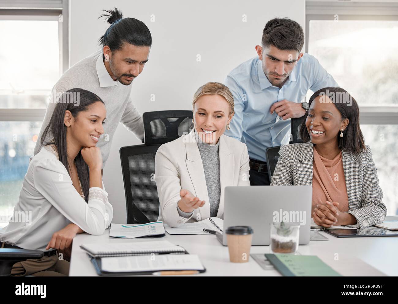 Accountants, laptop and collaboration of business people in office for ...