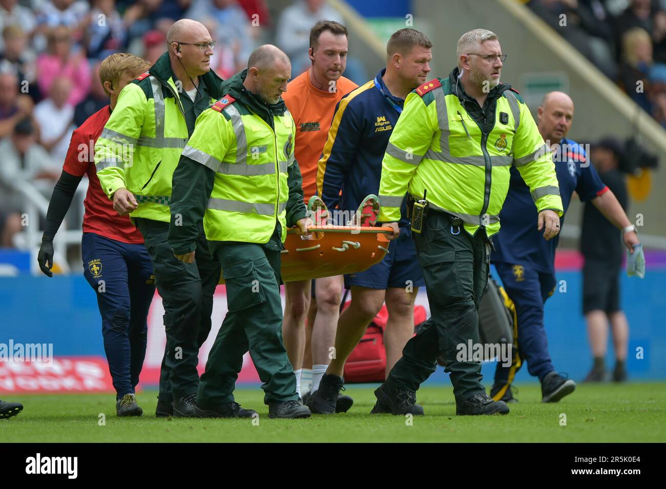 Jack Croft #38 of Wakefield Trinity leaves the field on a stretcher ...