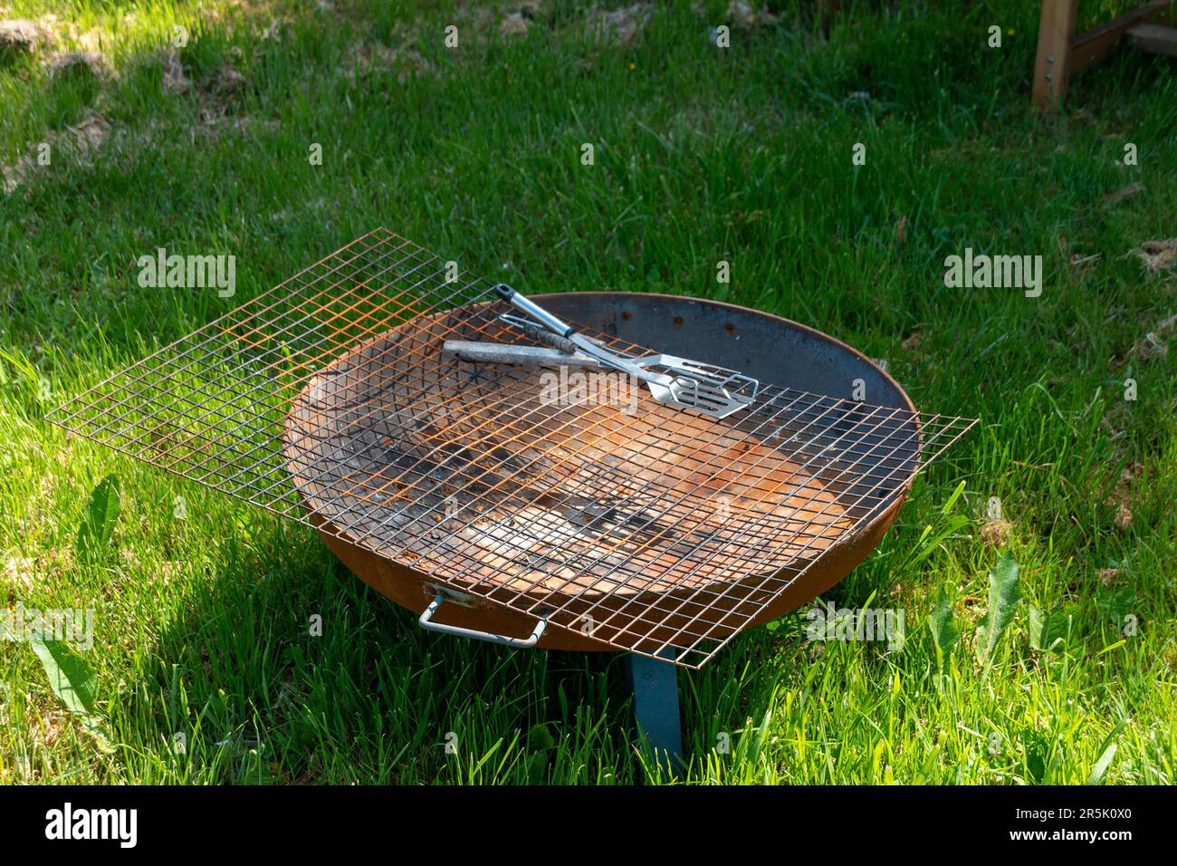 A barbecue area in a open camping field Stock Photo - Alamy