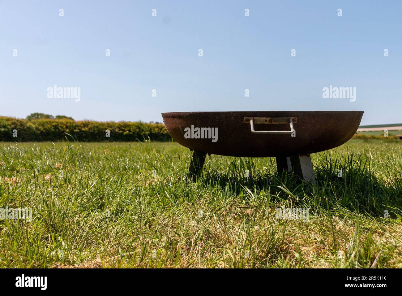 A barbecue area in a open camping field Stock Photo - Alamy